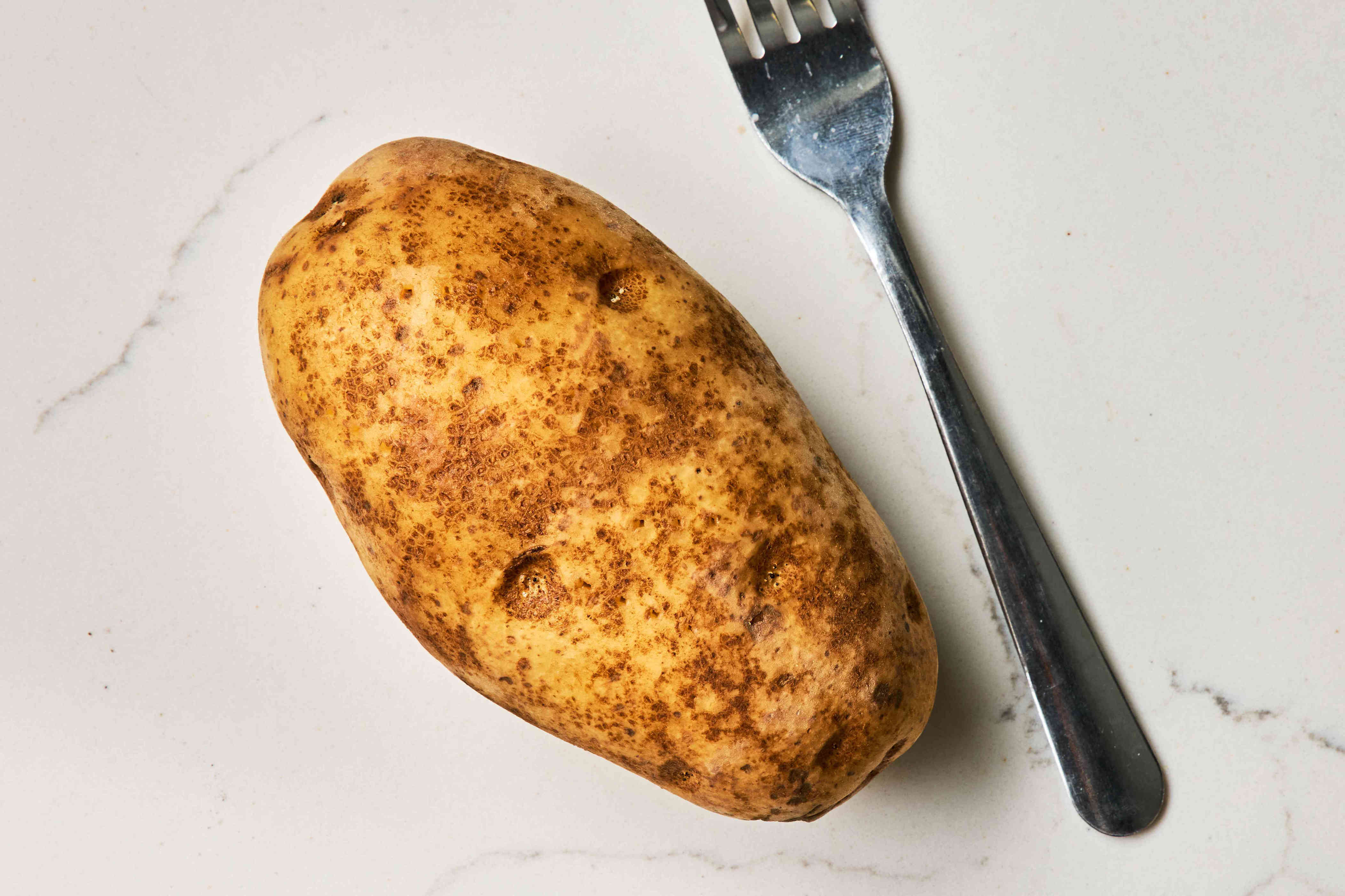 Do you really need to poke holes in baked potatoes before baking?