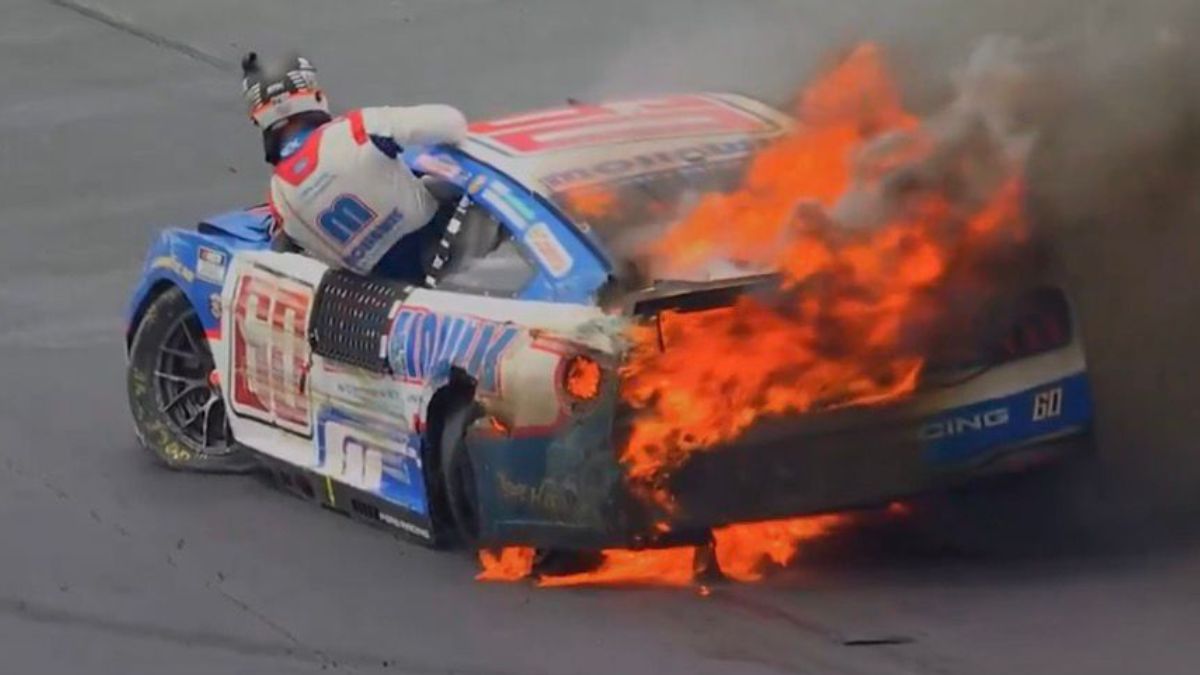 Horror scene in NASCAR race as burning car triggers rare red flag at Dover