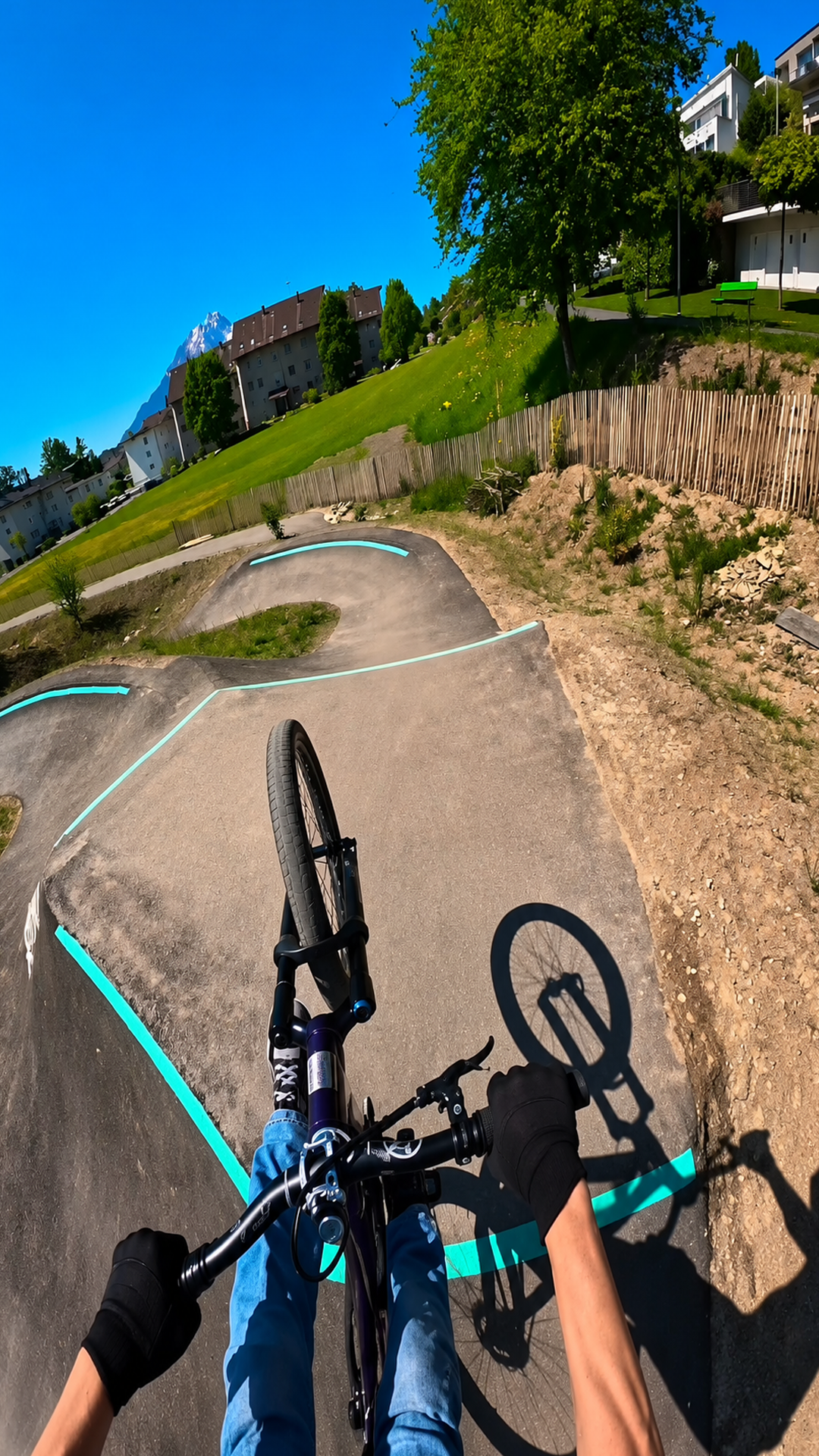 POV mountain bike tricks on a pump track
