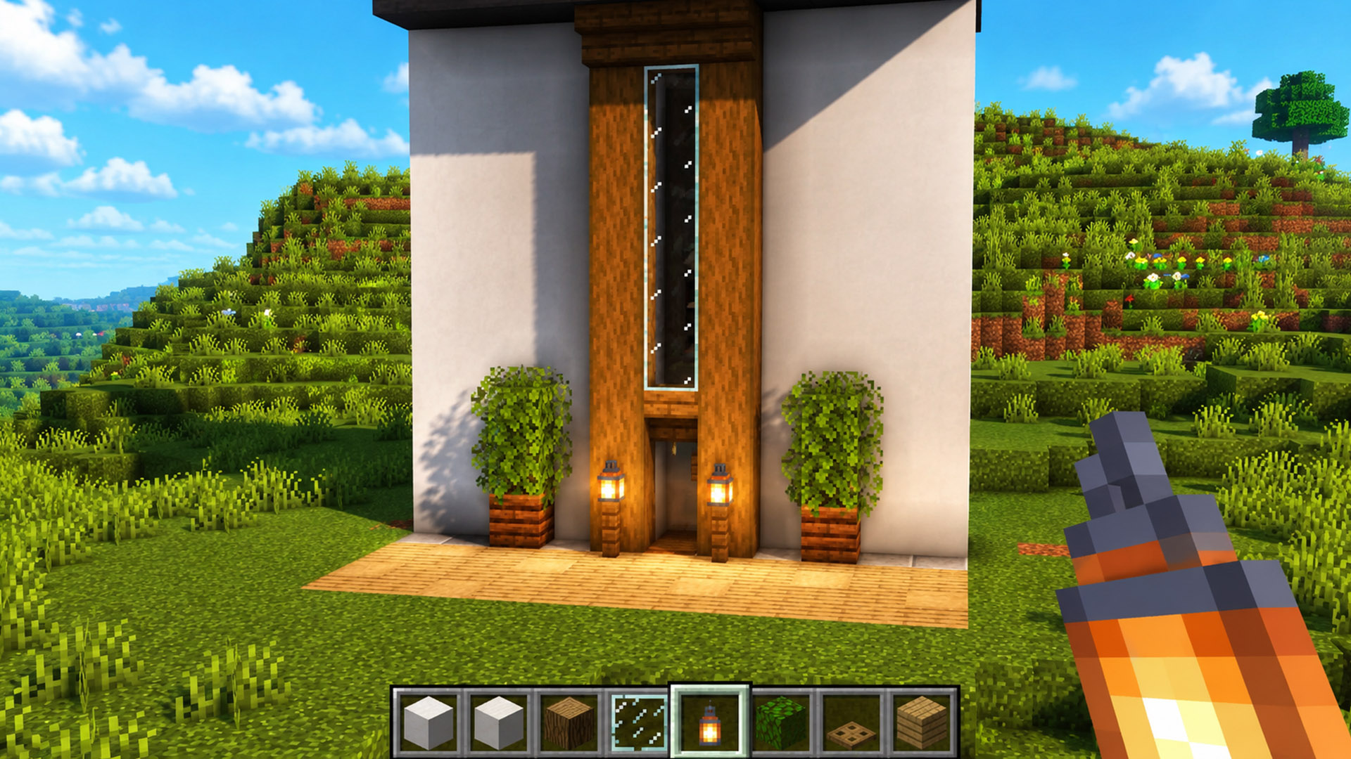 A clean hidden door design with lantern entrance details