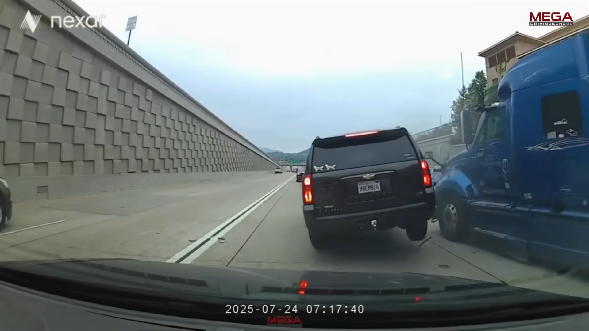 The violent truck collision that sent a car rolling