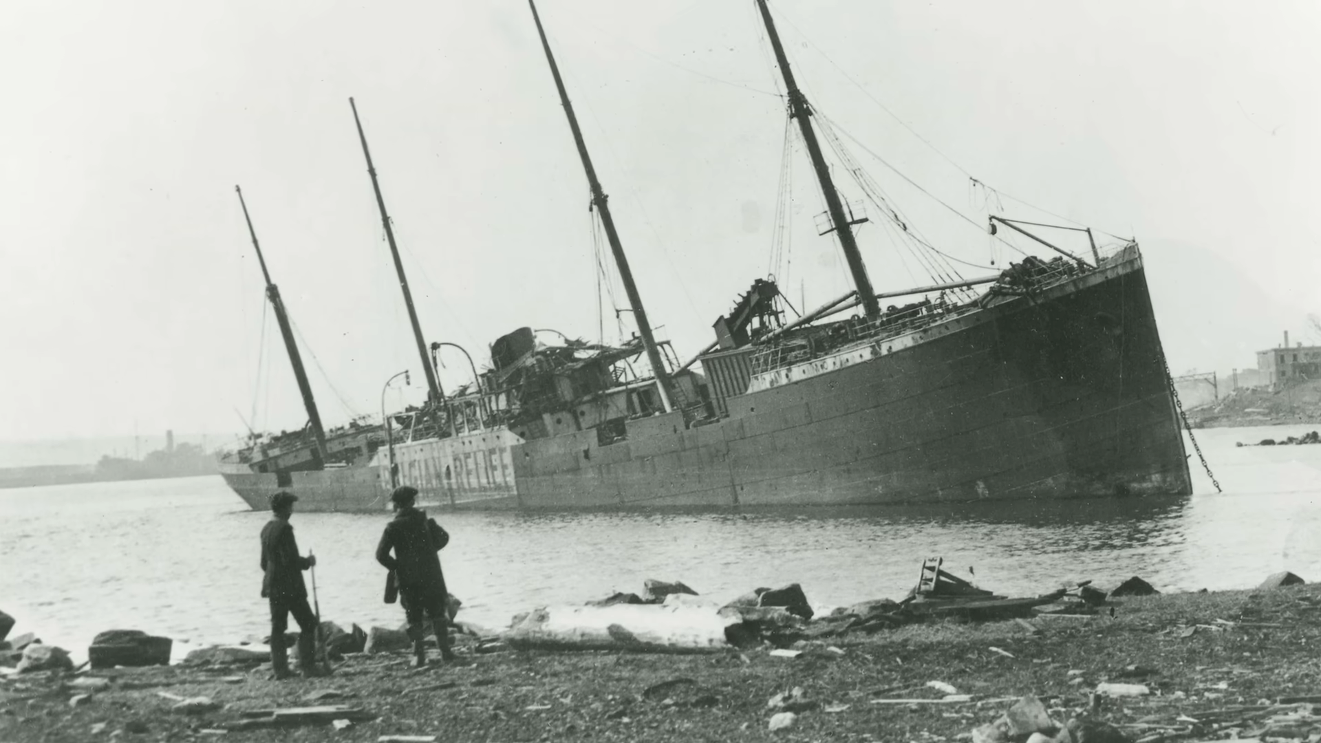 Watch a December storm swallow a ship like a tsunami