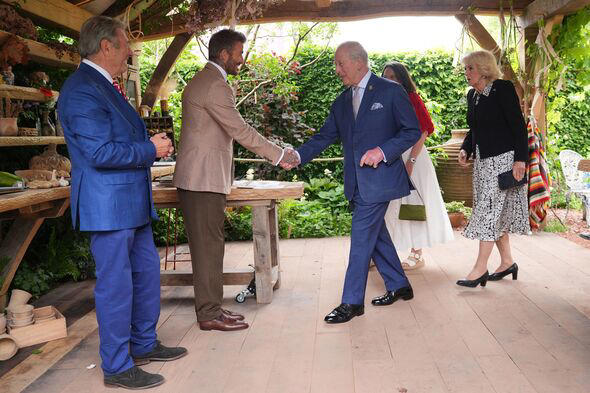 King Charles beams as he reunites with David Beckham at RHS Chelsea ...