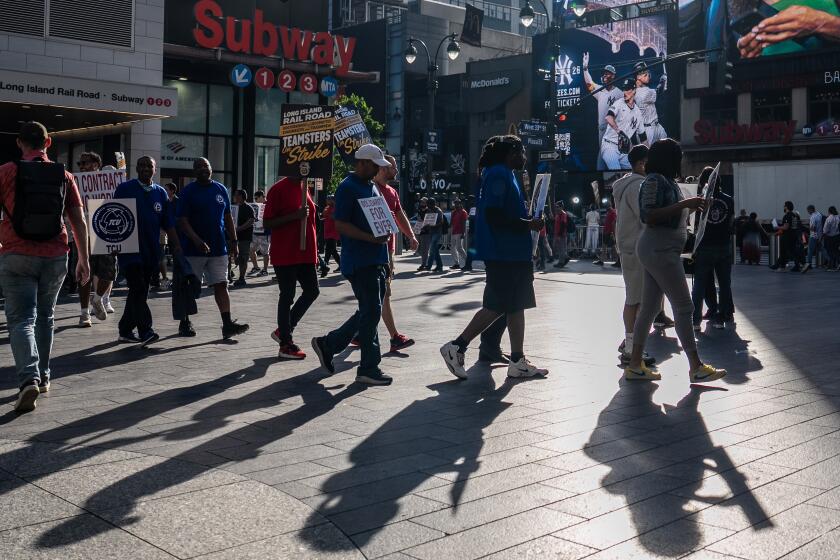 Riders navigate the first weekday of a strike that has shut down the ...