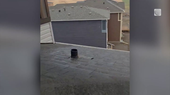 Hail pelts Calgary roof