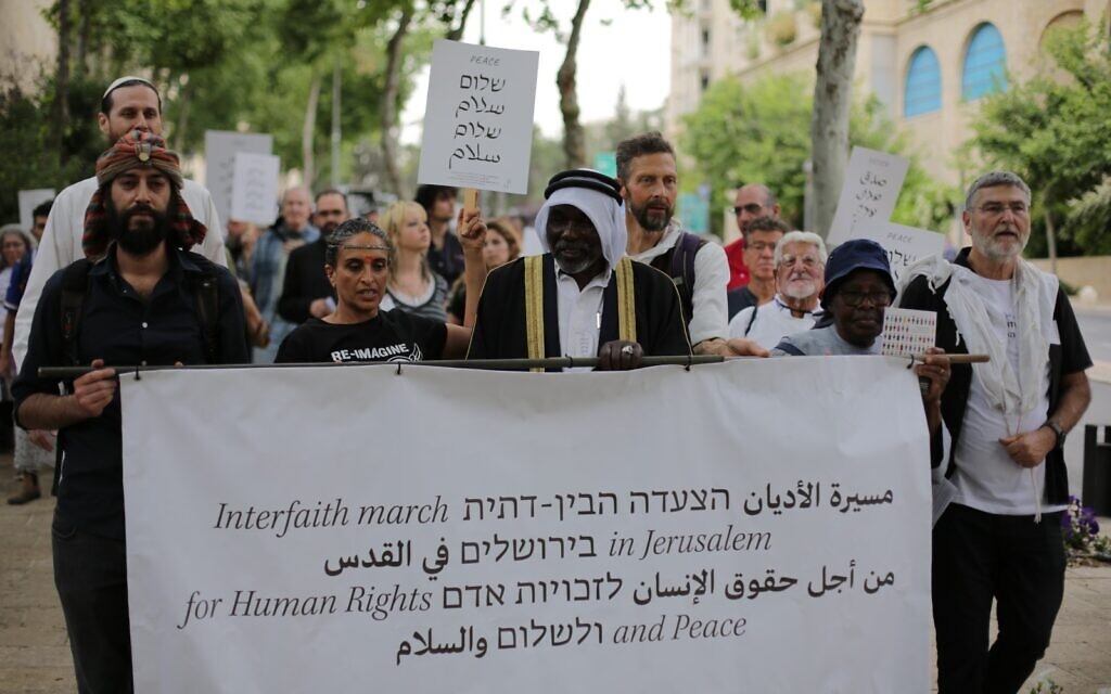 Hundreds join interfaith 'human rights and peace' march in Jerusalem