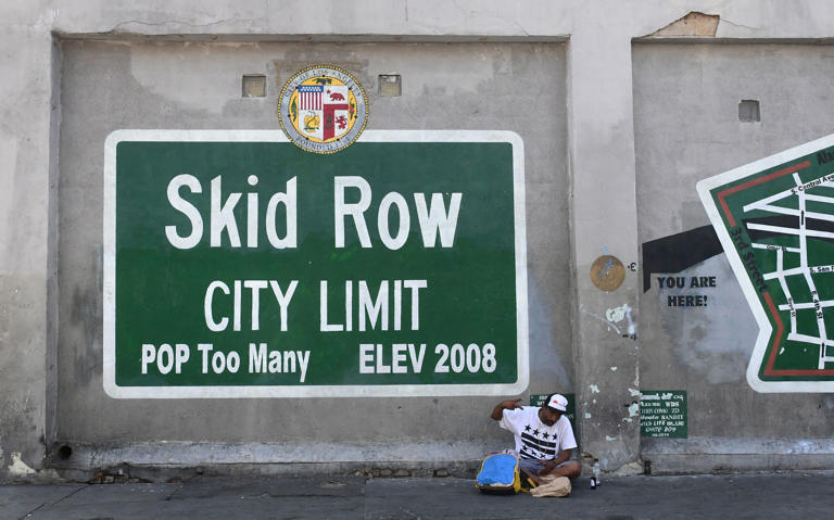Woman accused of paying homeless people to register to vote agrees to ...
