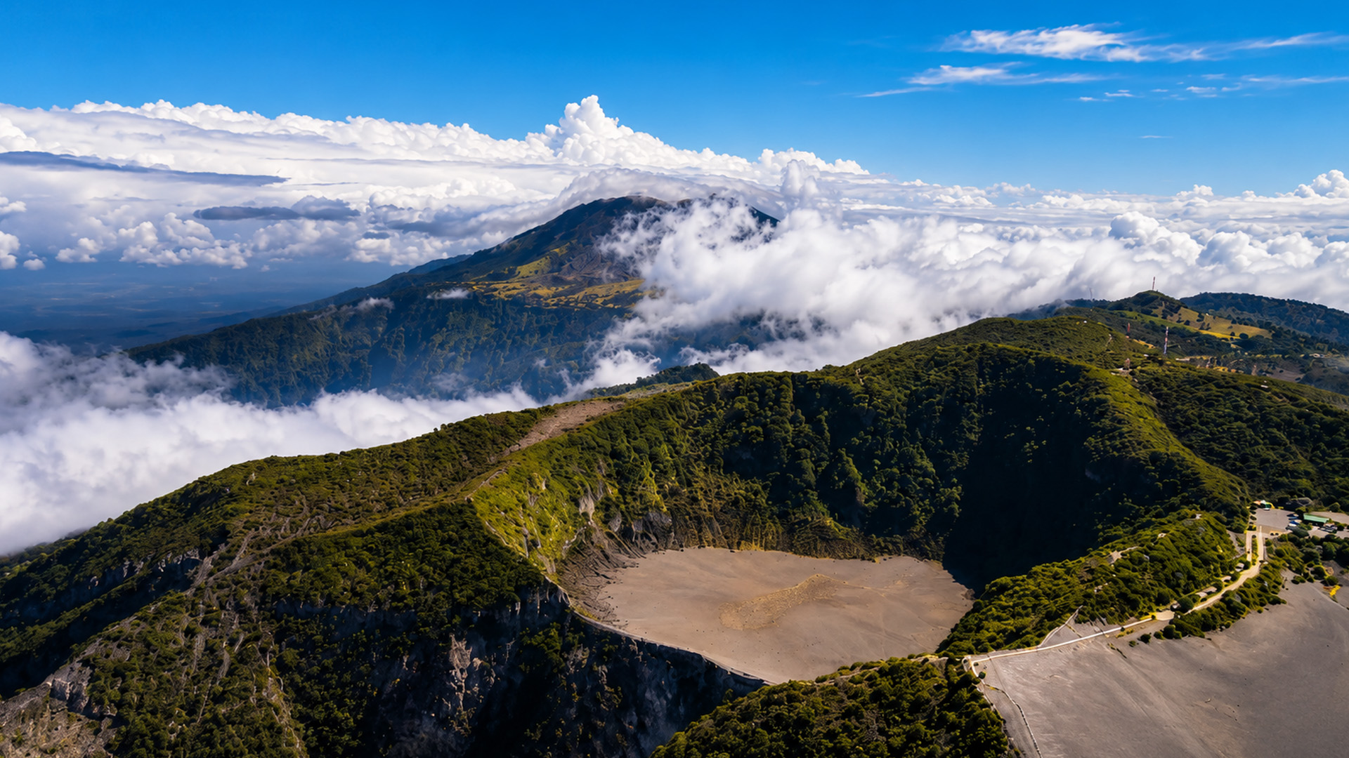 Clouds covering a remote volcanic landscape