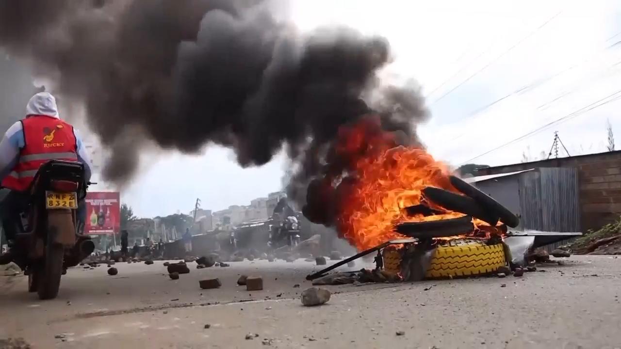 Protesters light bonfires during public transport strike in Kenya over ...