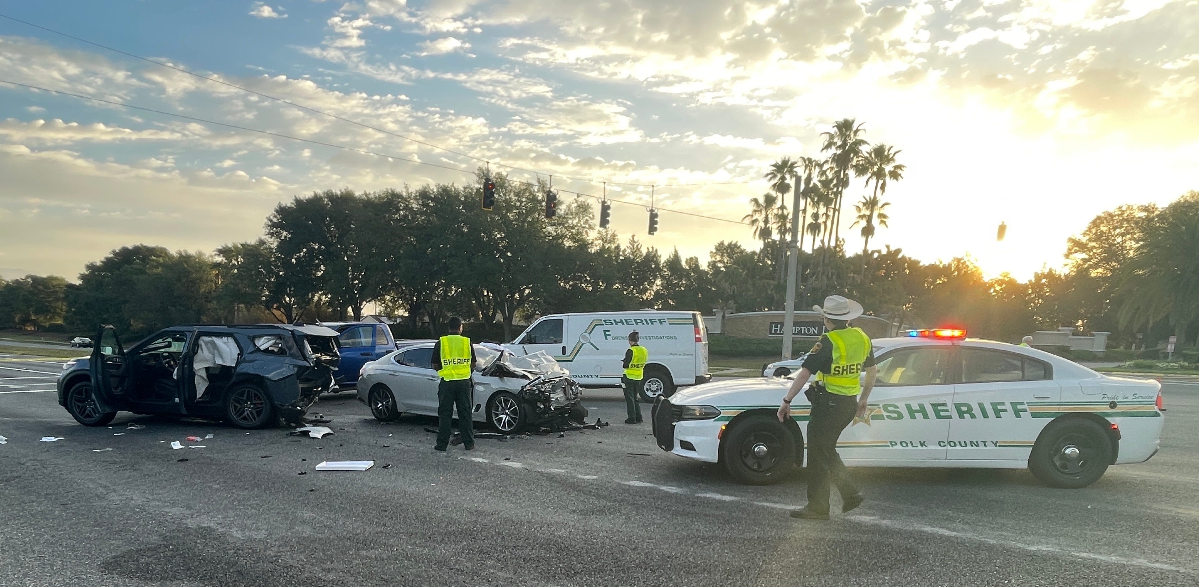 Driver, passenger die after rear-end crash at red light in Davenport