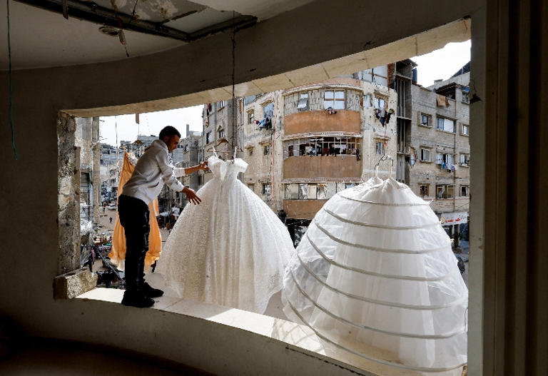 In war-scarred Gaza, brides turn to refurbished wedding dresses