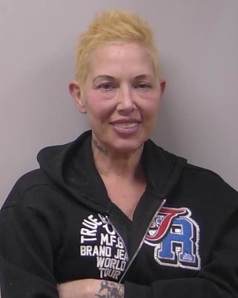 Eminem’s ex-wife, Kim Mathers, looks unrecognizable, flashes smile in ...
