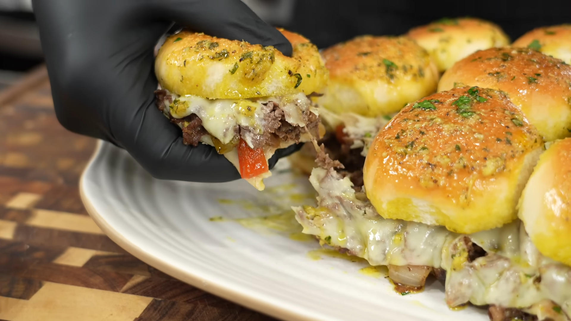 Simple cheesesteak sliders with big flavor and garlic butter