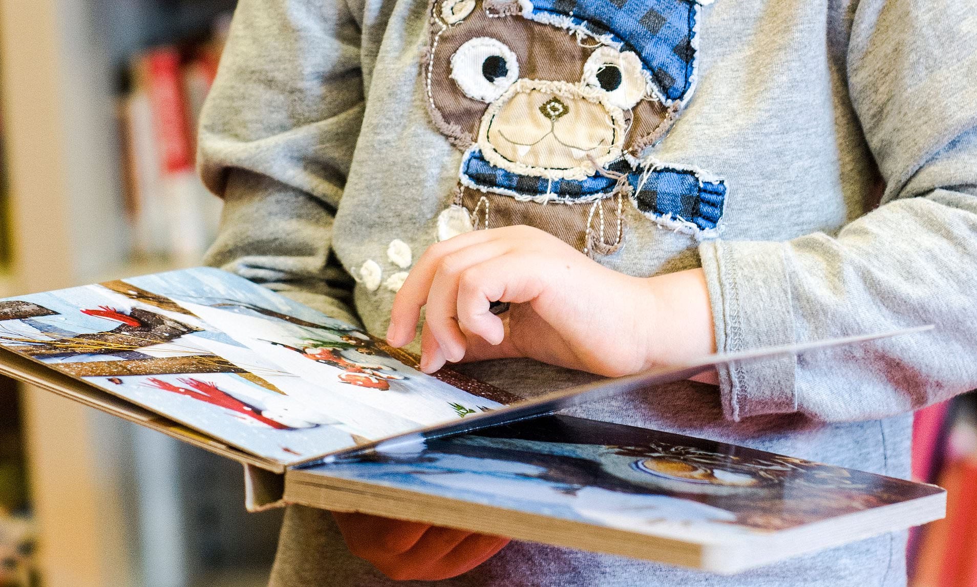 How children's screen time is seeing them swipe books as if they are ...