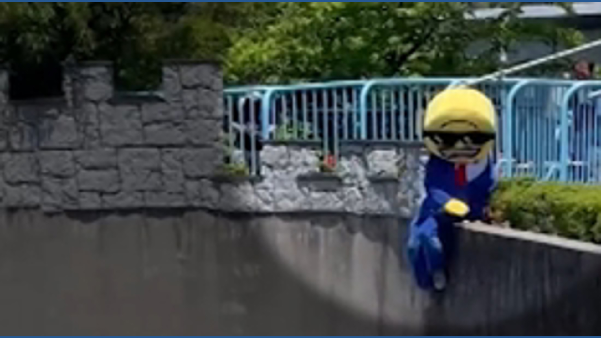 Costumed stunt at Japan zoo lands 2 Americans in custody