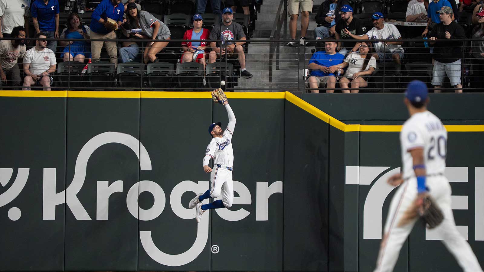 Rangers outfielder Brandon Nimmo gives Astros fan the ball from the ...
