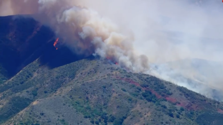 Mandatory evacuations underway as wildfire threatens several homes and ...