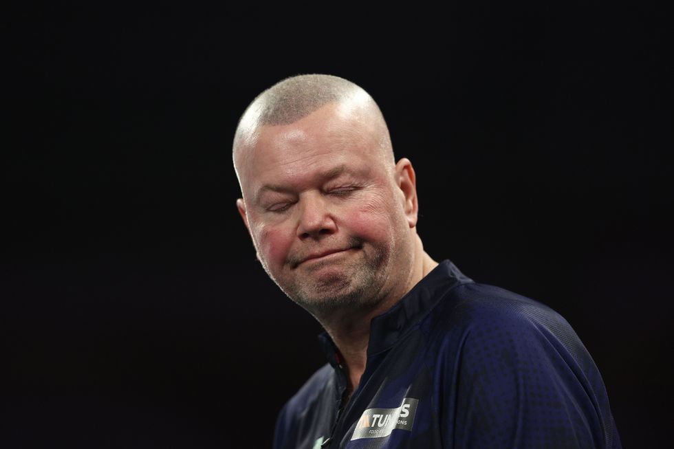Five-time world darts champion moves to UK in bid to save career