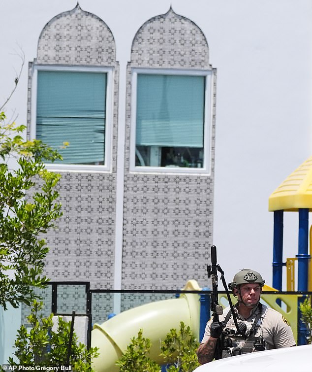 Five dead including security guard after two teenage gunmen open fire ...