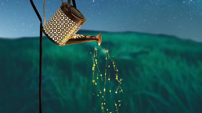 Walmart's $15 solar watering can light adds magical ambiance to your garden