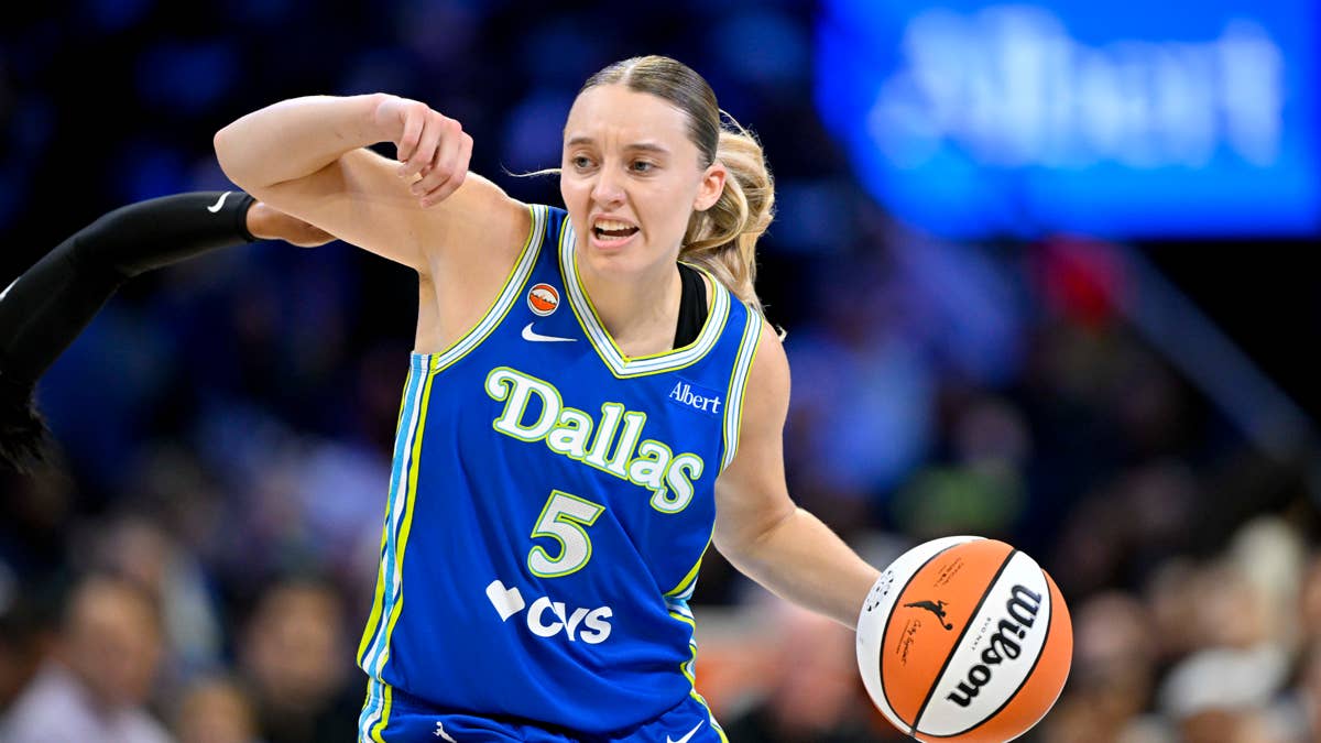 Paige Bueckers reacts to her jersey selling for record $64,720 at auction