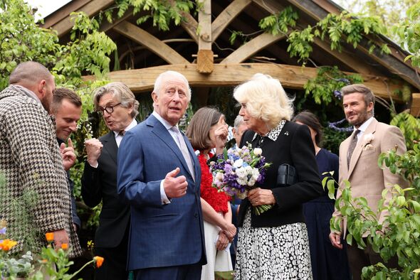 King Charles beams as he reunites with David Beckham at RHS Chelsea ...