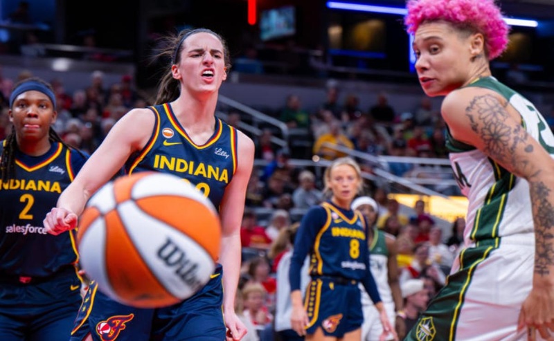 Caitlin Clark playfully hit Storm player with the Mutombo finger wag