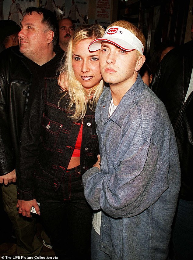 Eminem's unrecognizable ex-wife Kim cracks smile in latest mugshot ...