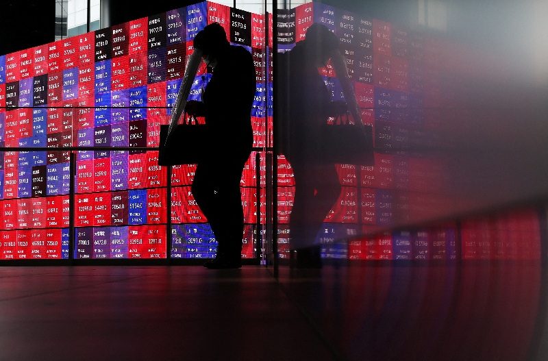 Asian shares mixed, bonds recover as oil eases on Trump's Iran comments