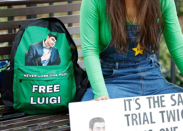 Luigi Mangione fangirls decked out with press passes celebrate ...