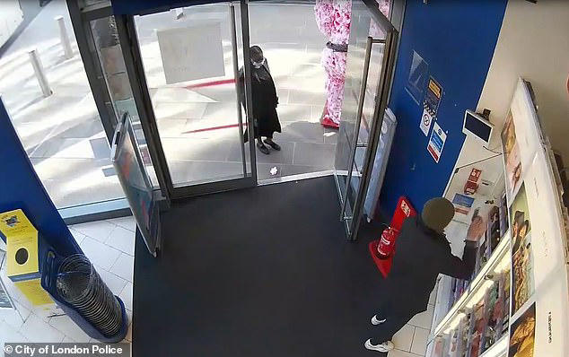 Moment thief calmly stuffs perfume bottles into his bag - before police ...