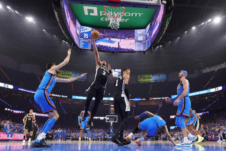 Wembanyama has 41 points, 24 rebounds and Spurs top Thunder 122-115 in ...