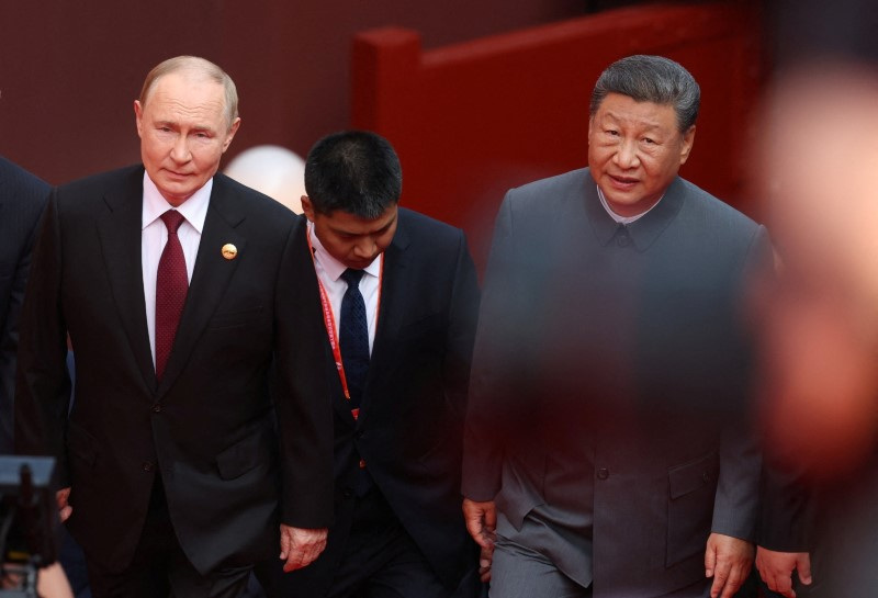 Xi to host 'old friend' Putin as China projects stable global role ...