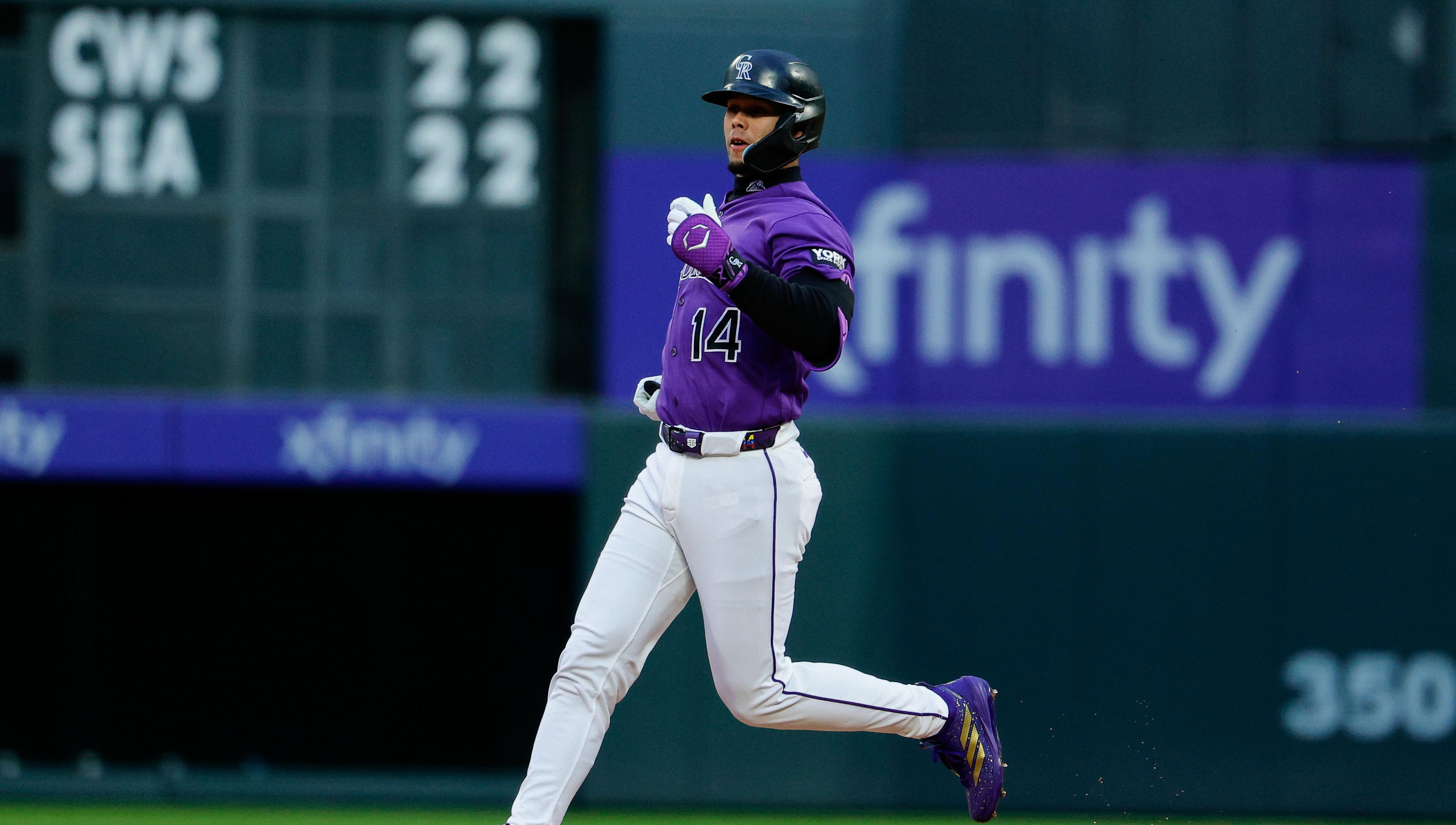 Rockies 7, Rangers 6: A wet and wild win