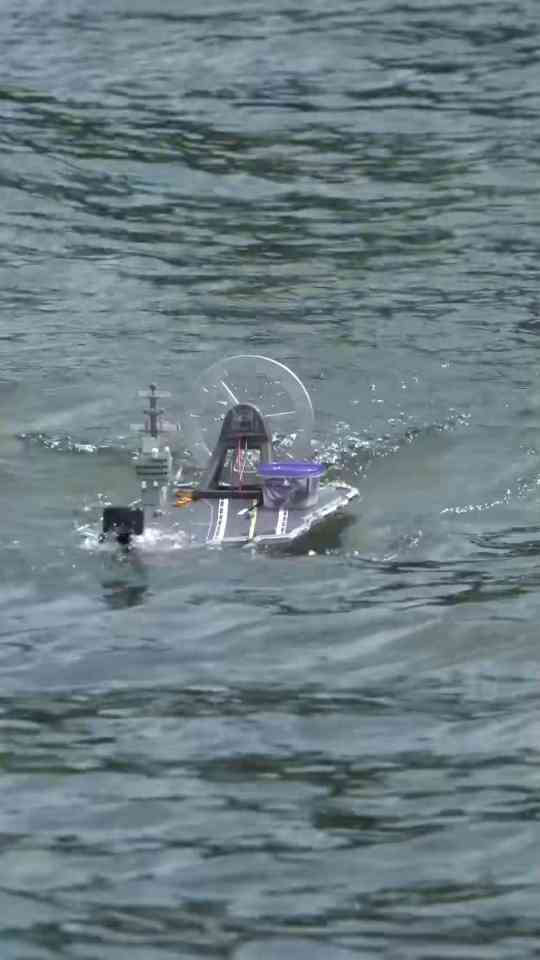 RC aircraft carrier with reaction wheel stabilizer