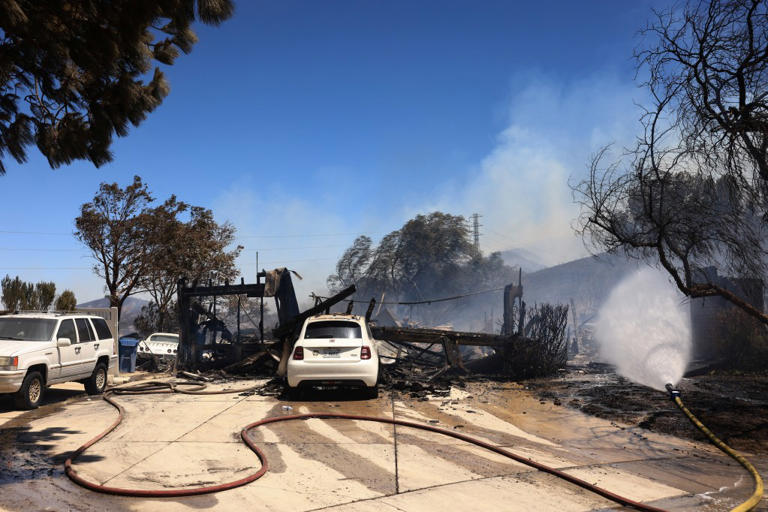 Sandy Fire torches home, triggers mass evacuations at zero containment
