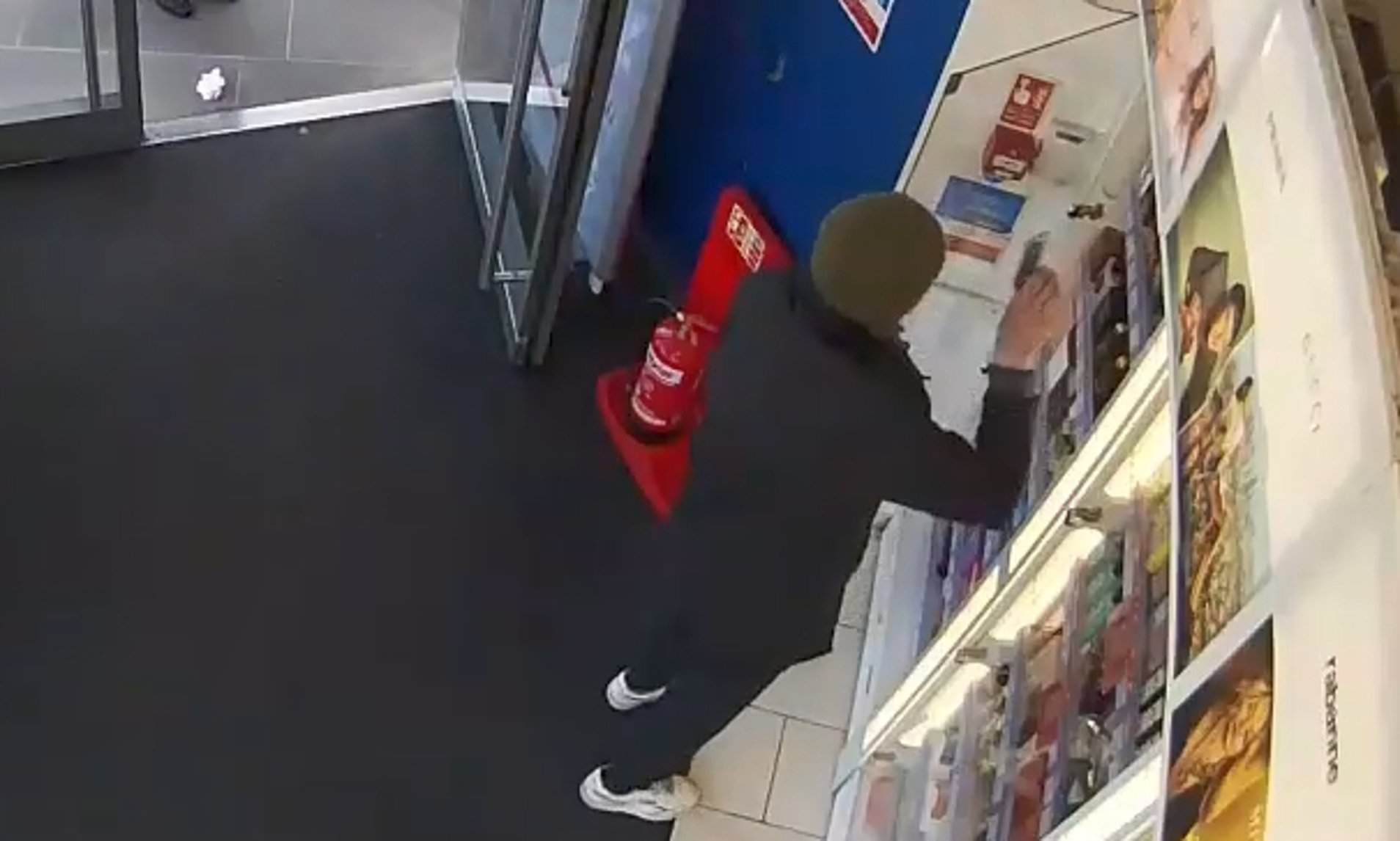 Moment thief calmly stuffs perfume bottles into his bag - before police ...
