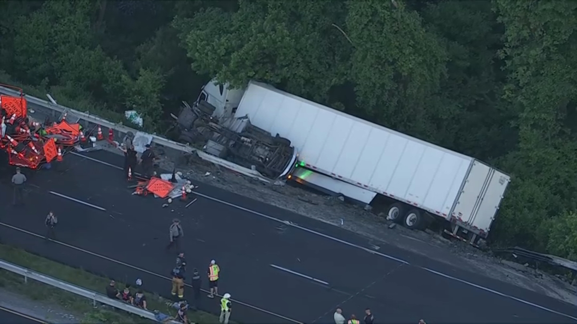 Semi-truck, flipped car crash into wooded area off Route 30 in Coatesville