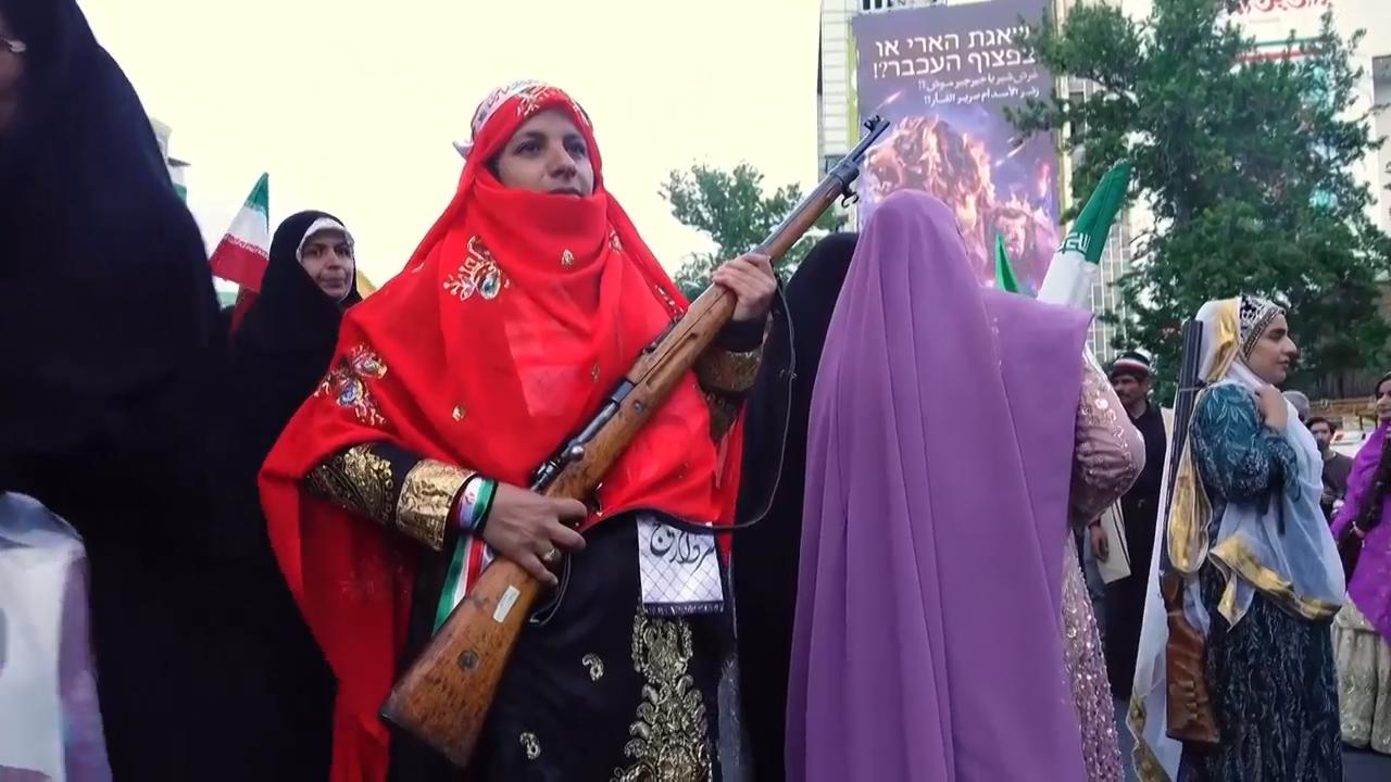 Armed members of Iran's nomadic Bakhtiari tribe march in Tehran amid ...
