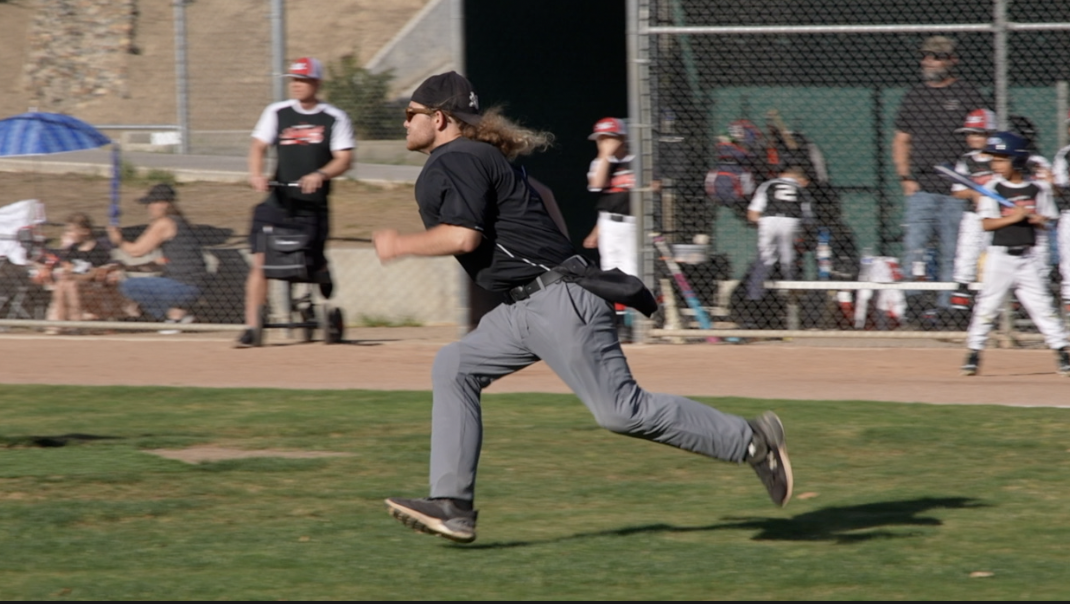 Teen umpire goes viral for energy he brings to Little League games