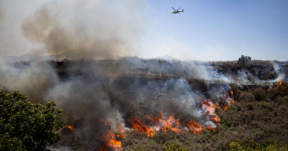 Sandy fire erupts in Simi Valley after tractor strikes rock ...
