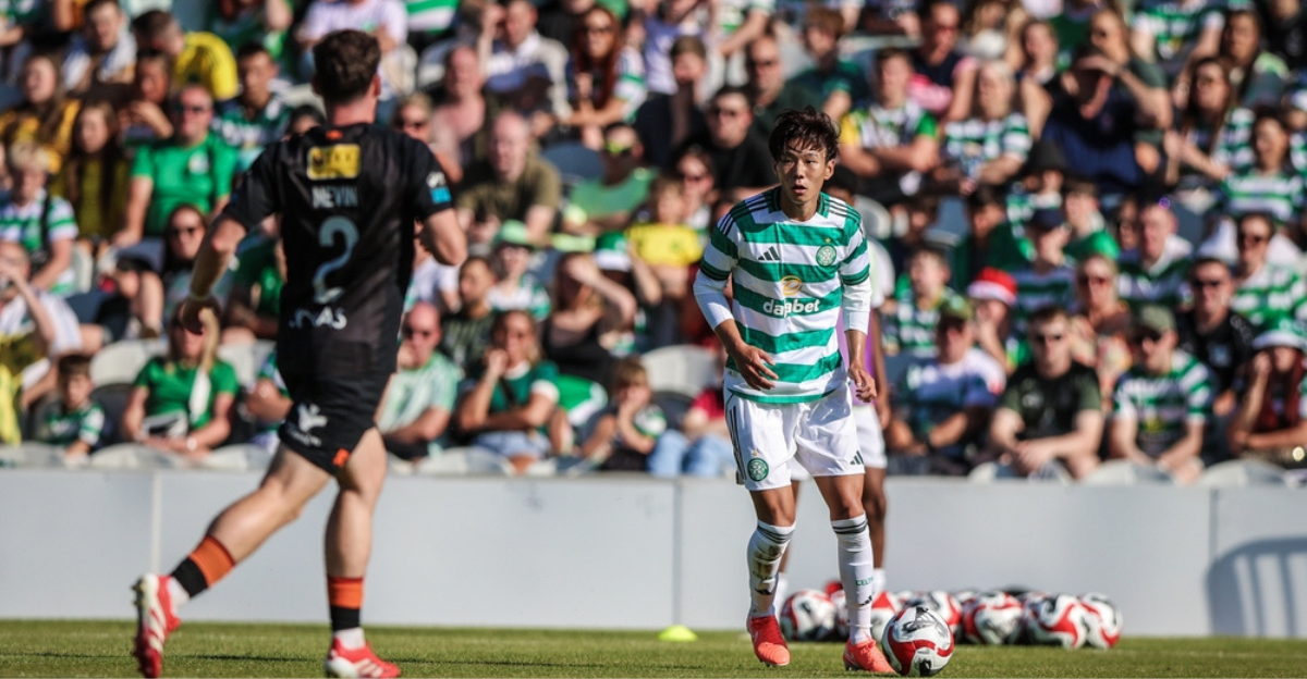 Celtic’s fifth title marred by pitch invasion and early end to Hearts match