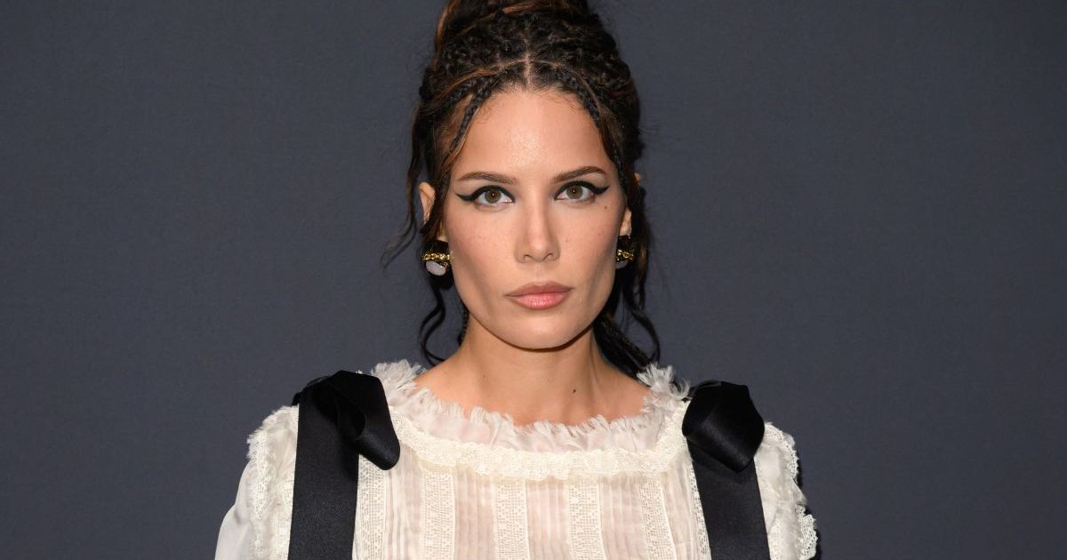 Halsey layers fully see-through Chanel top under micro minidress