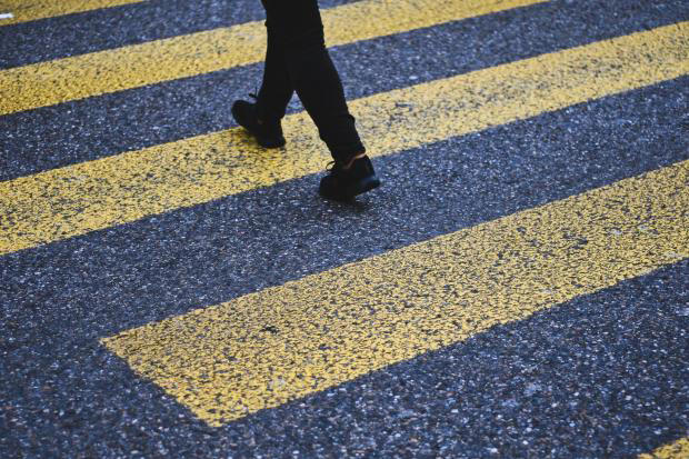 Pedestrian is rushed to hospital after collision with car on major ...