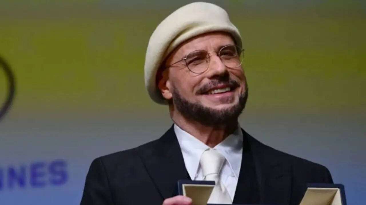 John Travolta shares reason for his 'beret' look at Cannes Film ...