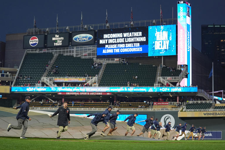 Josh Bell homers twice as Twins beat Astros 6-3 in game delayed nearly ...