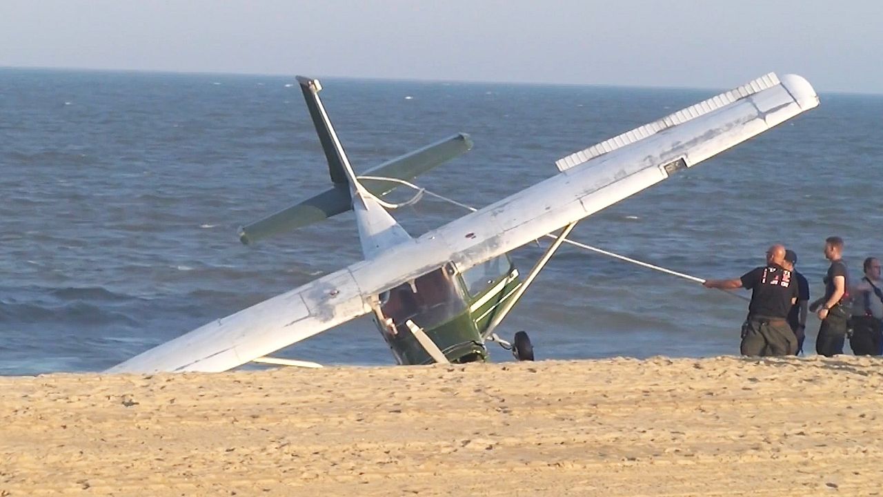 Small plane makes emergency beach landing among sunbathers in Maryland