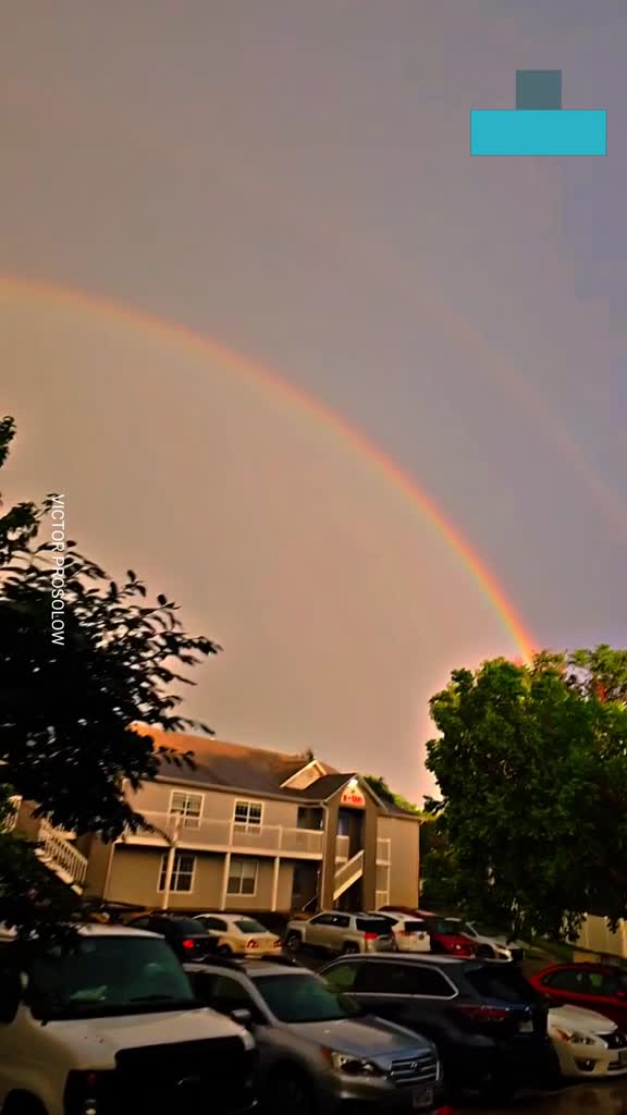 Dad runs outside during tornado sirens only to find giant double ...