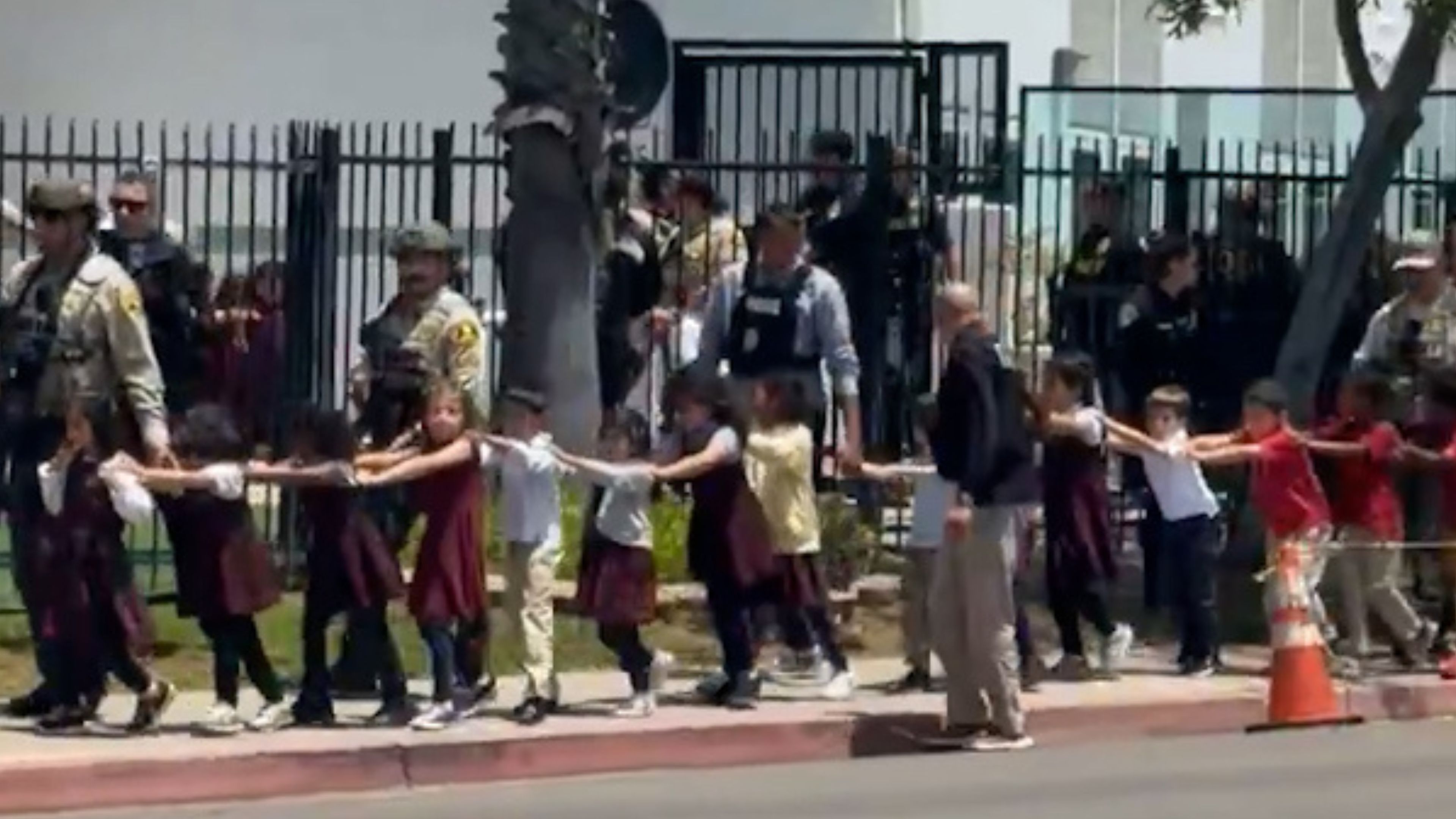 Video shows children being evacuated after shooting at San Diego mosque