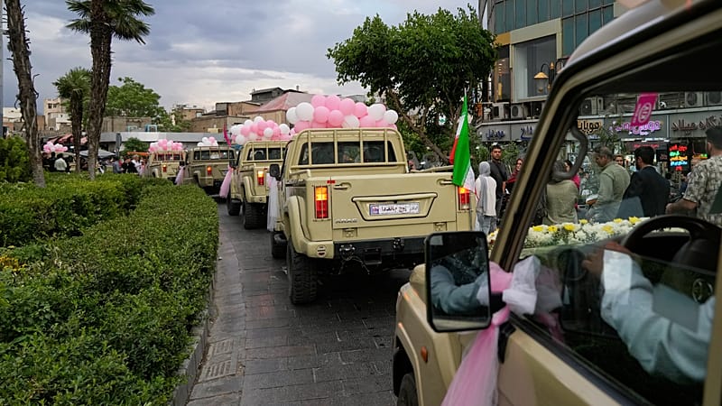 Tehran mass wedding turns military vehicles into bridal cars